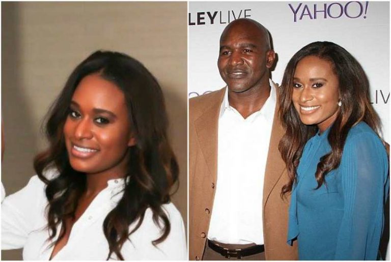 Cruiserweight champion Evander Holyfield and his large family: wife, kids